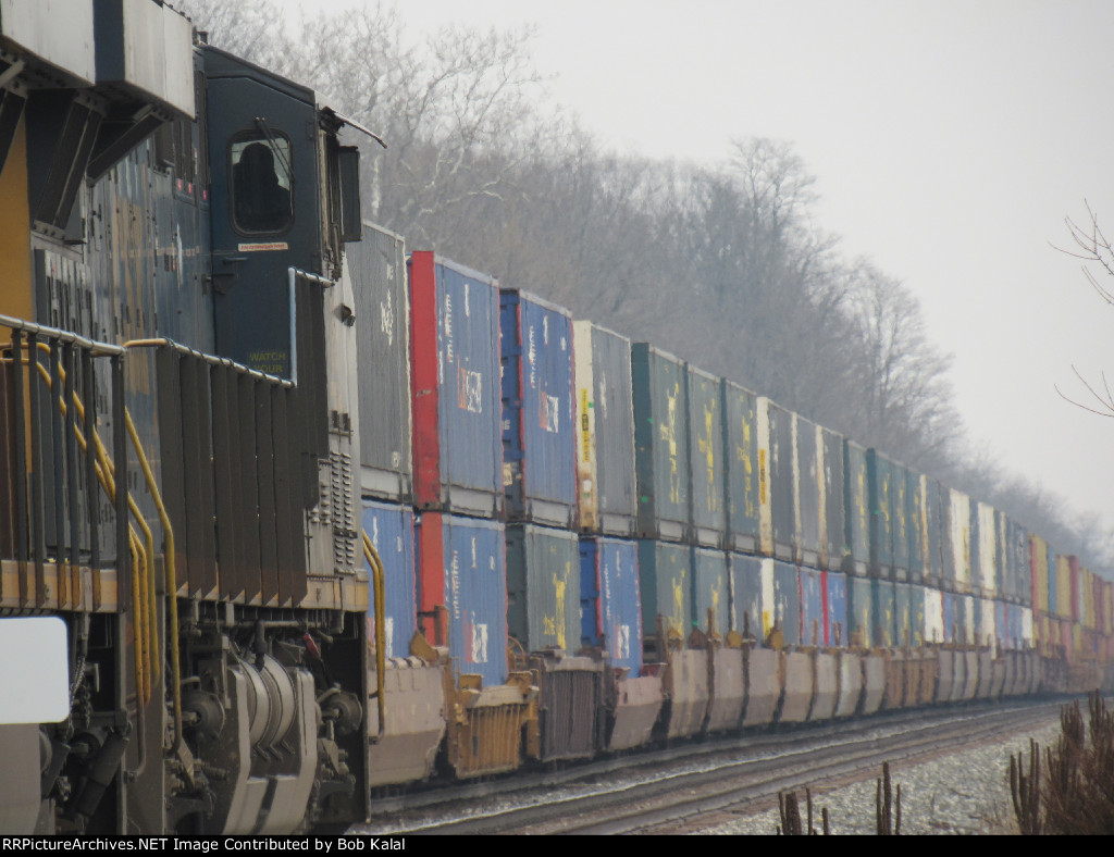 CSX 991 & 5476 moves east while CSX 3207 heads west